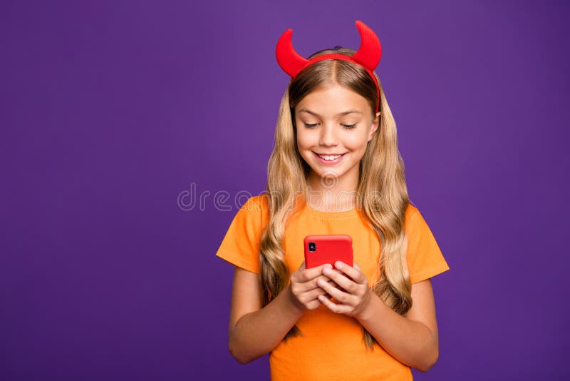 Photo Of Pretty Small Lady Horns Headband Holding Telephone Hands