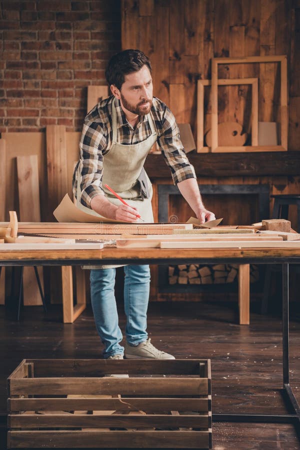 Photo of Professional Builder Guy Thinking Writing Paper Blueprint in ...