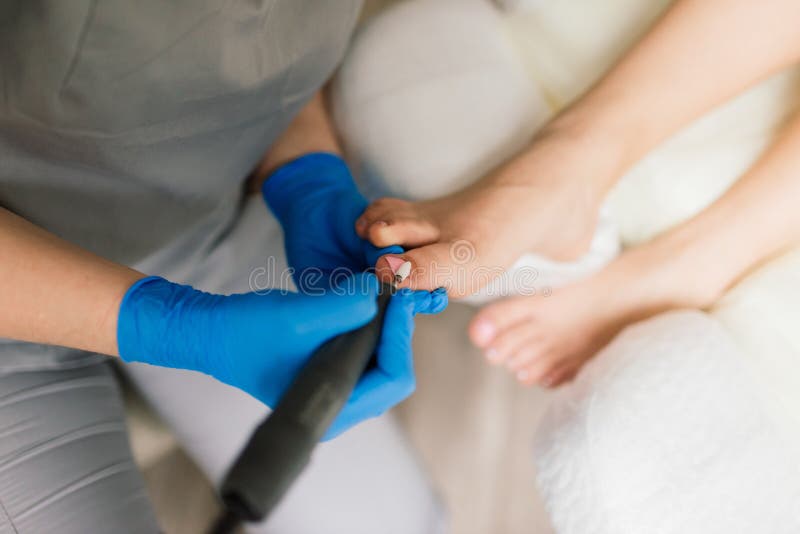 Photo of the Professional Pedicure Process with the Model Stock Photo ...