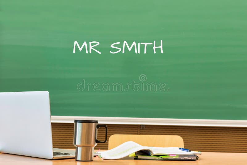 Photo of Professor Desk in Classroom with Miss Simpson Name Written in ...