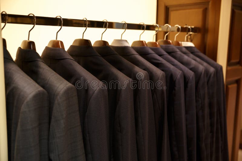 Photo of rack with suits stock image. Image of hanger - 91448227