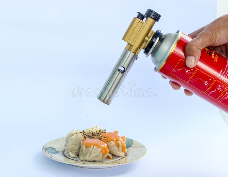 Photo of Ready-to-eat Food Burning with a Lighter Stock Image - Image ...