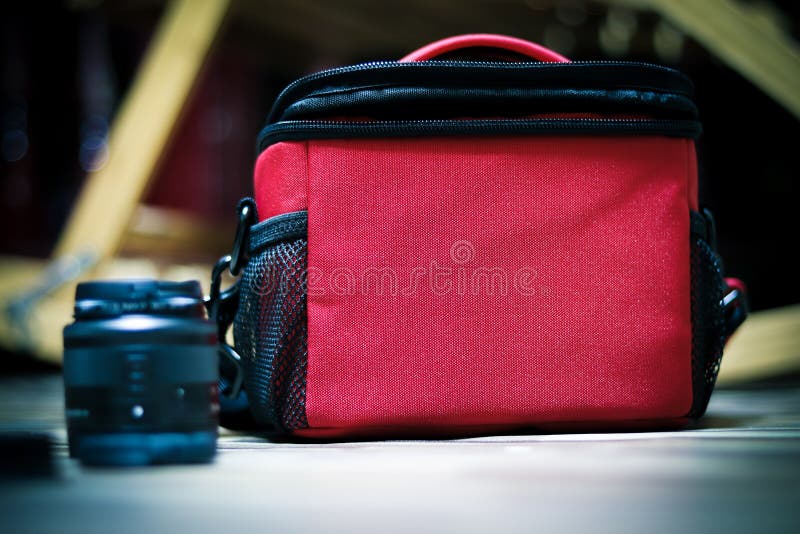A Photo of a Red Camera Bag with Lens Stock Photo - Image of luggage ...