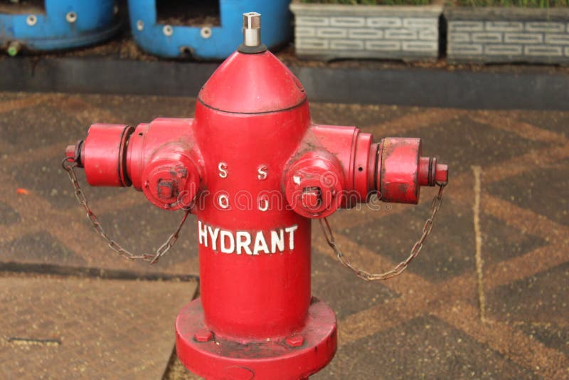 A Photo of a Red Fire Hydrant on a City Pedestrian Stock Image - Image ...
