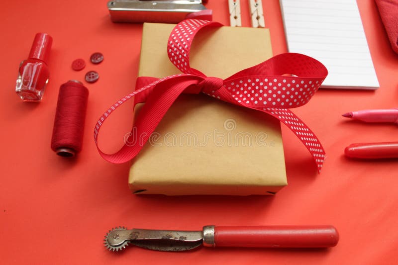 Photo of Red Ordinary Object on Red Background. Nail Polish, Gift Box ...