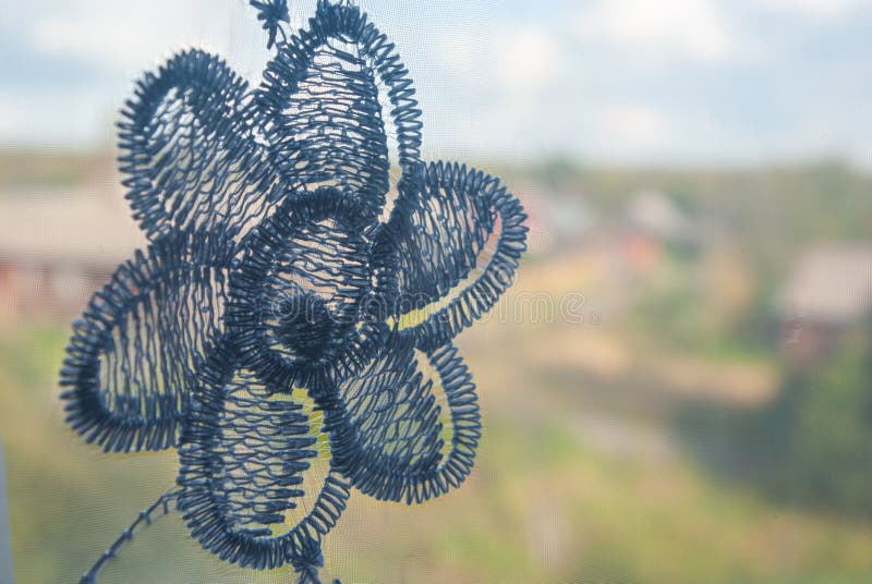 Photo of a Red Tulle on a Window with a Thread Pattern Stock Image ...