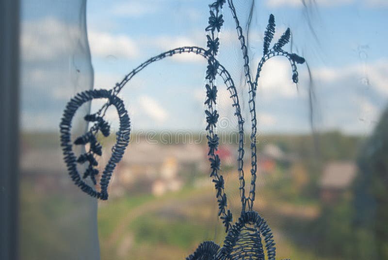 Photo of a Red Tulle on a Window with a Thread Pattern Stock Image ...