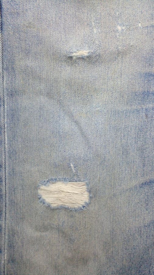 Photo of Ripped Jeans Detail Stock Image - Image of jeans, detail ...