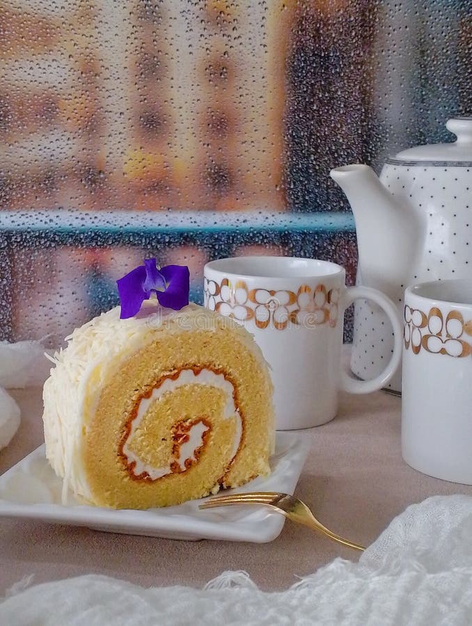 Photo of a Roll of Cheese Cake on the Dining Table Stock Image - Image ...