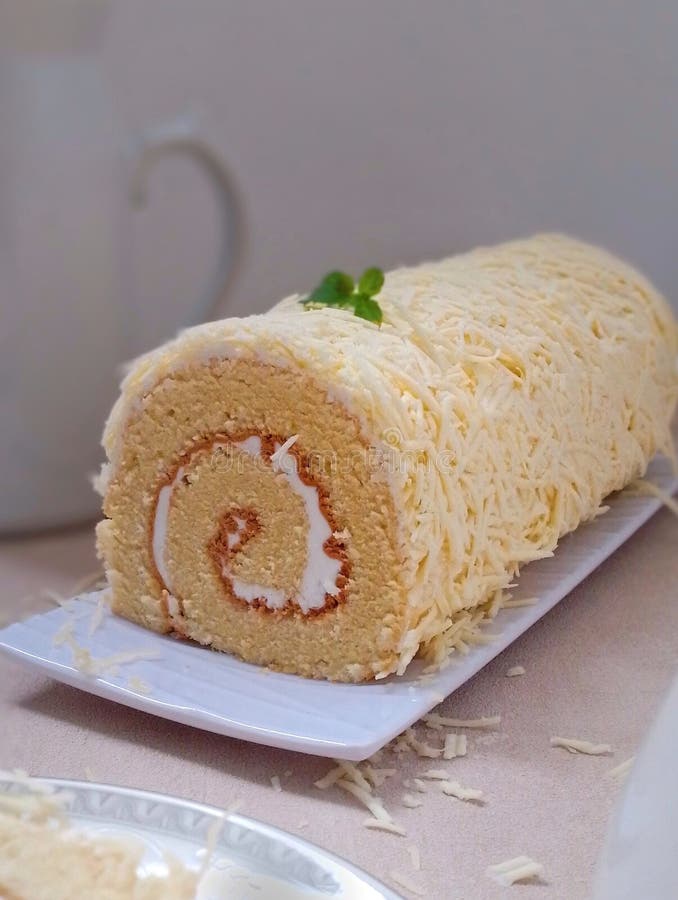 Photo of a Roll of Cheese Cake on the Dining Table Stock Image - Image ...