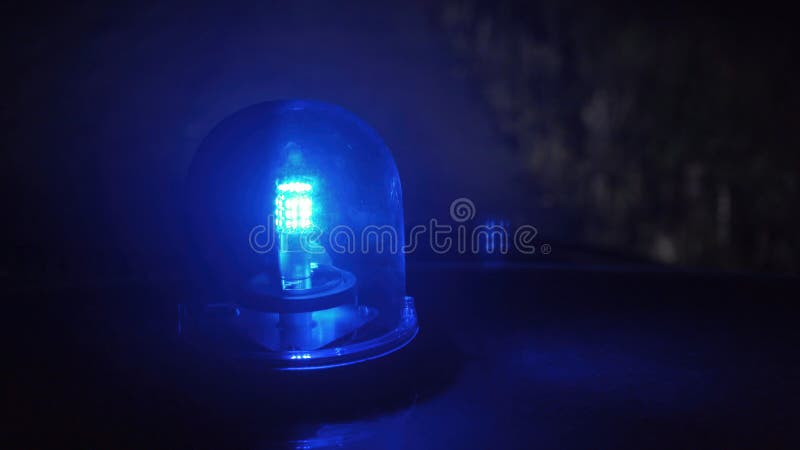 Shooting of Rotating Blue Emergency Light in the Night Stock Image ...