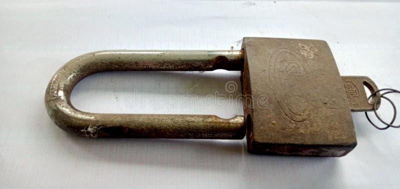 A Photo of a Rusty Padlock, Complete with Its Key Stock Photo - Image ...