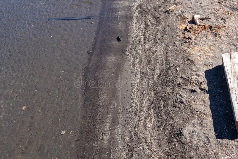 Photo of Sand and Dirt Ground with Marks of Waves in the Shore Stock ...