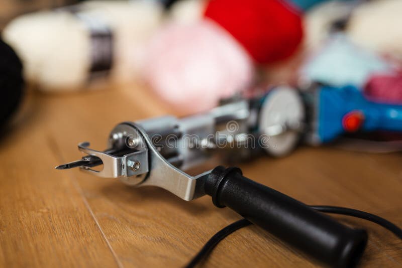 Photo of Sewing Machine and Threads on Floor Stock Image - Image of ...