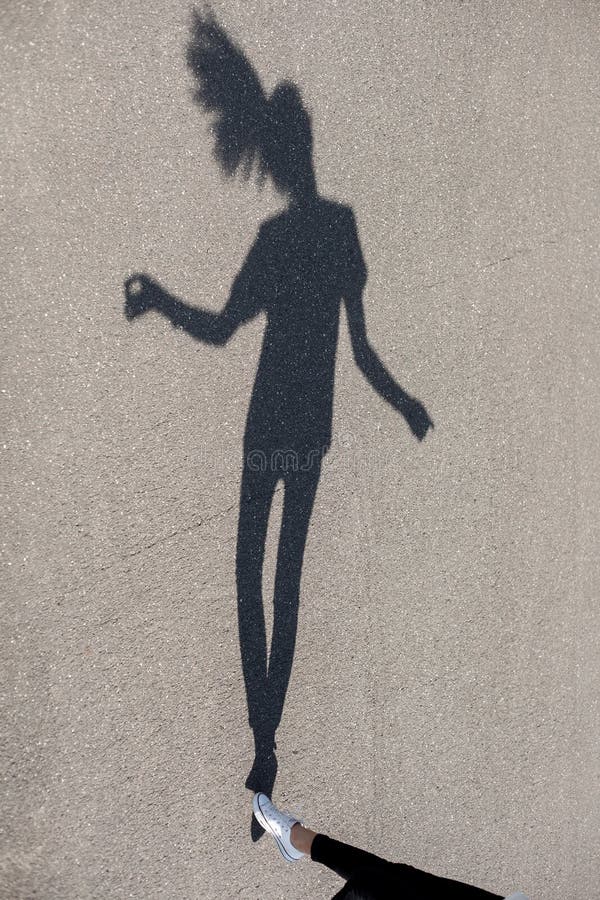 Photo of Shadow of Girl Dancing at Street Stock Image - Image of ...