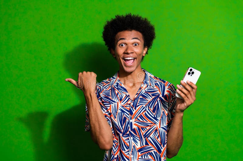 Photo Of Shocked Funky Man Dressed Print Shirt Chatting Modern Gadget