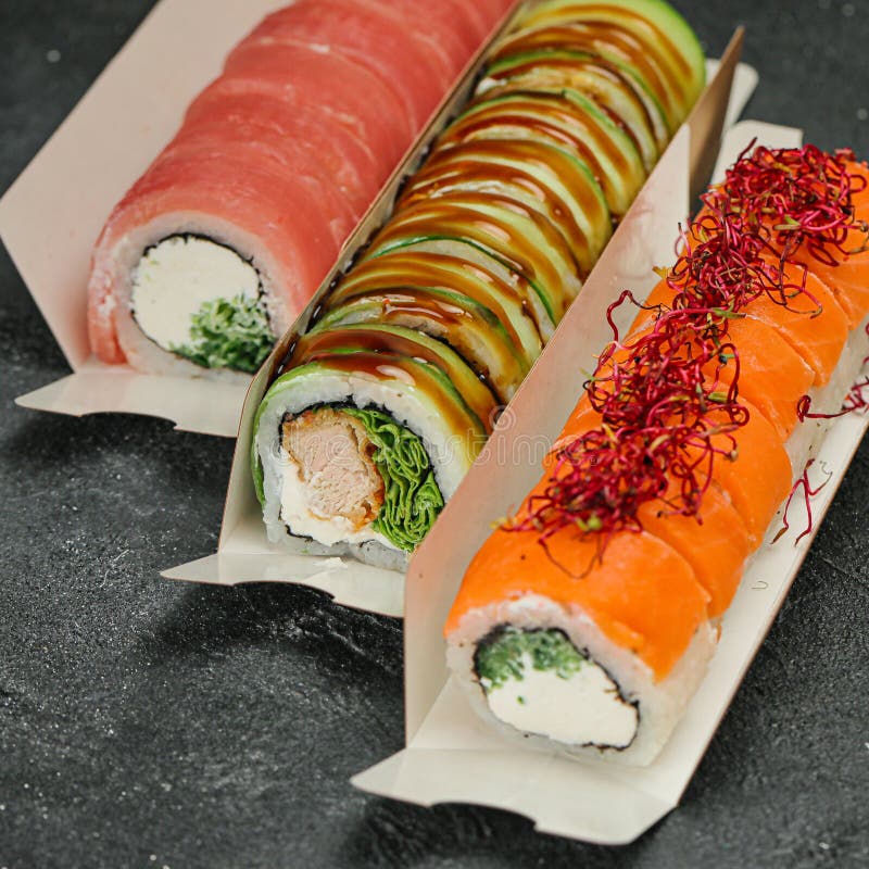 Three Different Types of Sushi on a Table Stock Photo - Image of ...