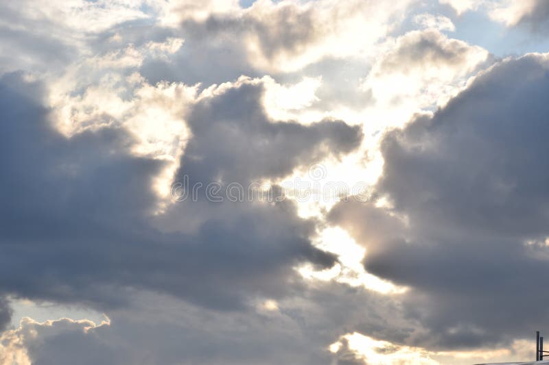In the Photo the Sky is in Clouds Illuminated by the Sun Stock Image ...