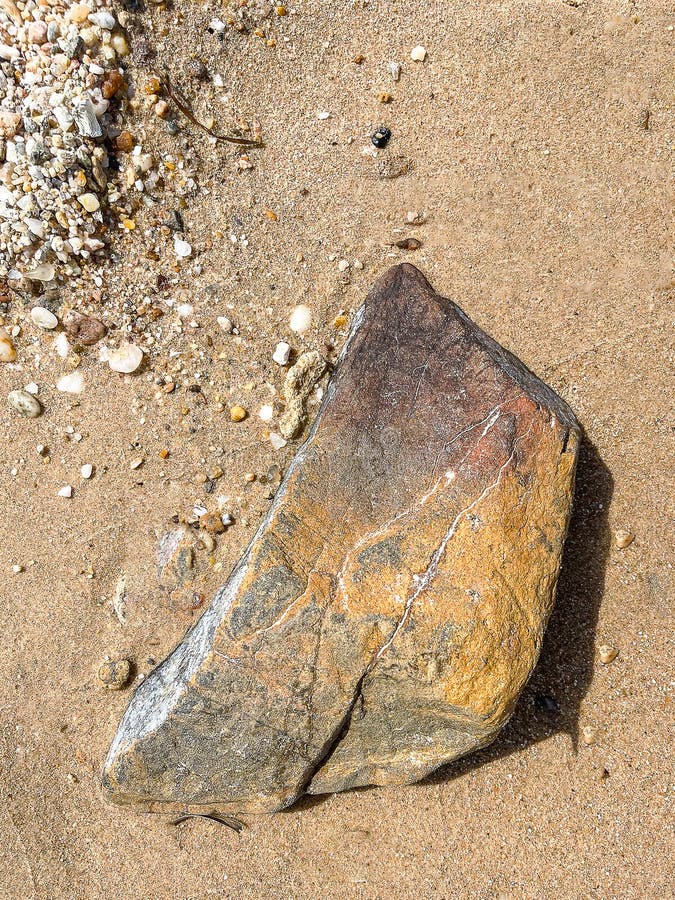 A Shape of a Rock in a Sand in a Beach Stock Image - Image of small ...
