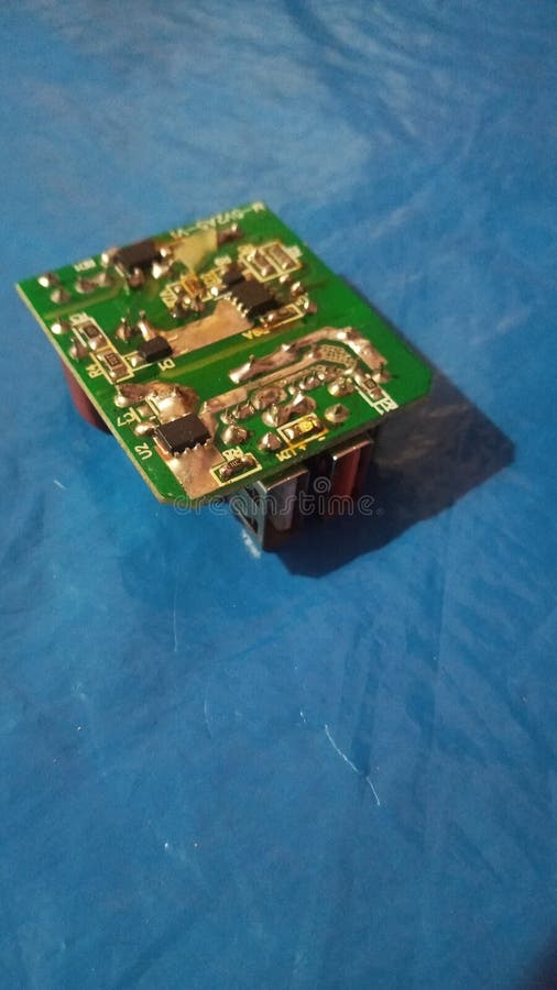 Photo of a Small Electronic Device Blue Background Stock Image - Image ...