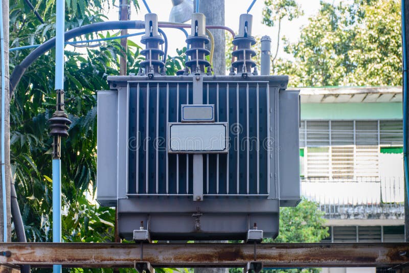 Photo of Small Size Transformer Stock Photo - Image of immersed, power ... Photo of Small Size Transformer Stock Photo - Image of immersed, power ...