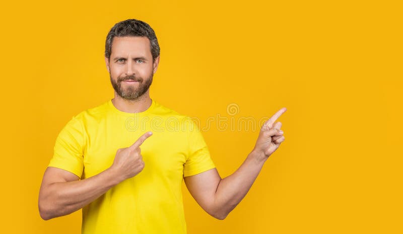 Photo of Smiling Man Pointing at Advertisement Offer. Man Pointing at ...
