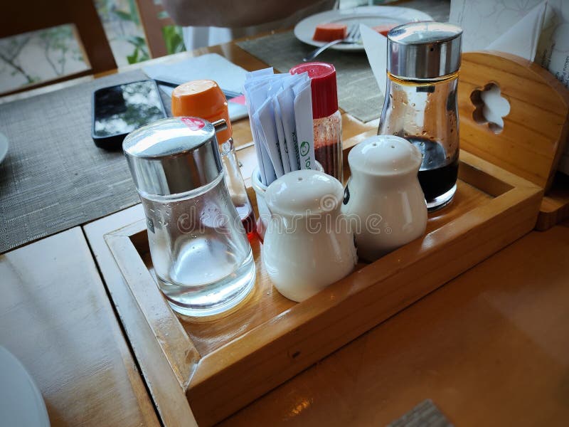 Photo of Spice Toothpick and Napkin in Holder on Table. Stock Photo ...