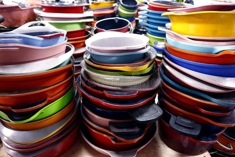 Assorted Colorful Ceramic and Steel Cooking Pans Stock Image - Image of ...