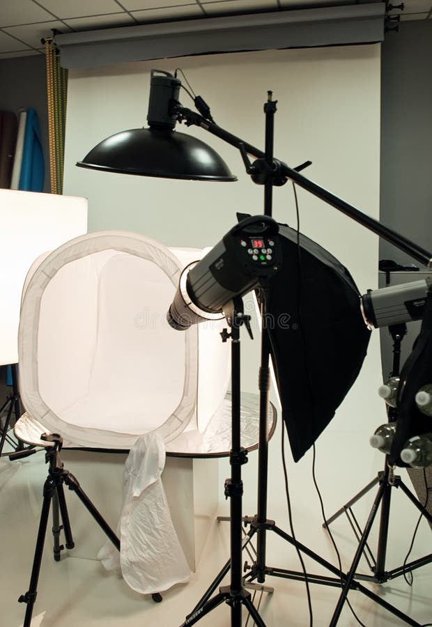 Photographer Working with a Cute Model in a Professional Studio Stock ...