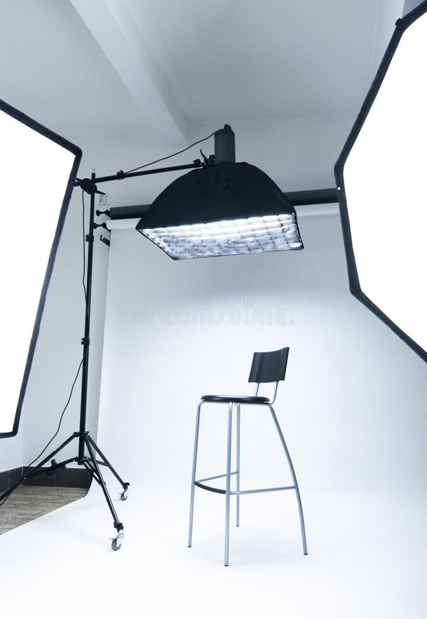 Photographer Working with a Cute Model in a Professional Studio Stock ...