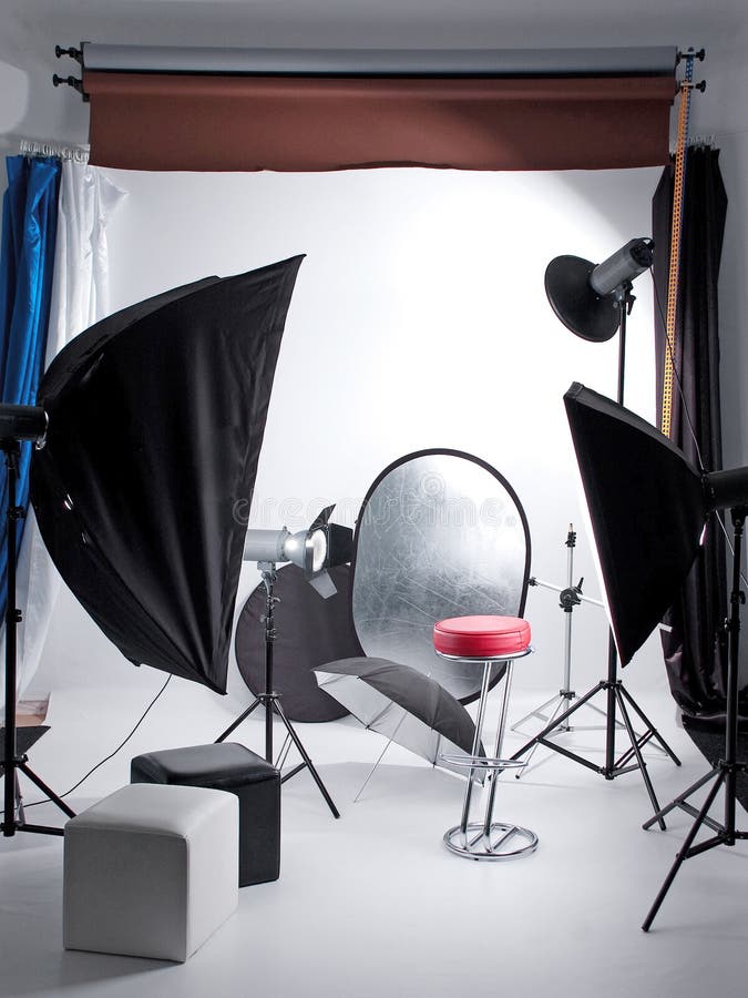 Photographer Working with a Cute Model in a Professional Studio Stock ...