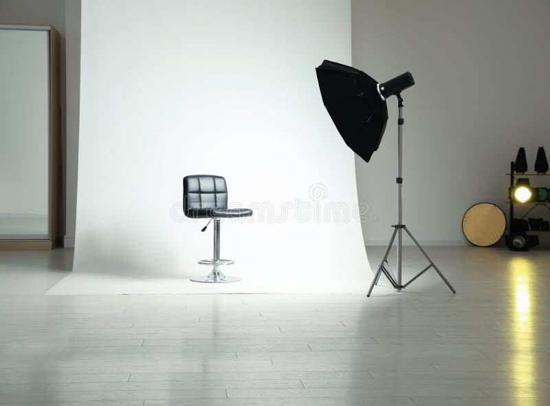 Photo Studio Interior with Modern Chair and Professional Lighting ...