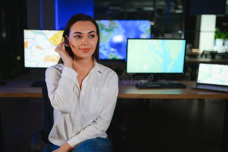 Photo of a Successful Dispatcher Working on a Computer in the Office ...