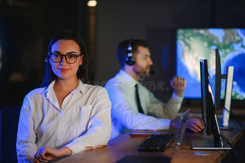 Photo of a Successful Dispatcher Working on a Computer in the Office ...