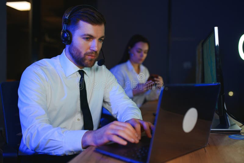 Photo of a Successful Dispatcher Working on a Computer in the Office ...
