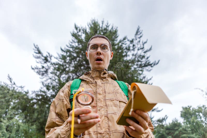 Photo of Surprised Man with Compass Stock Image - Image of pencil ...