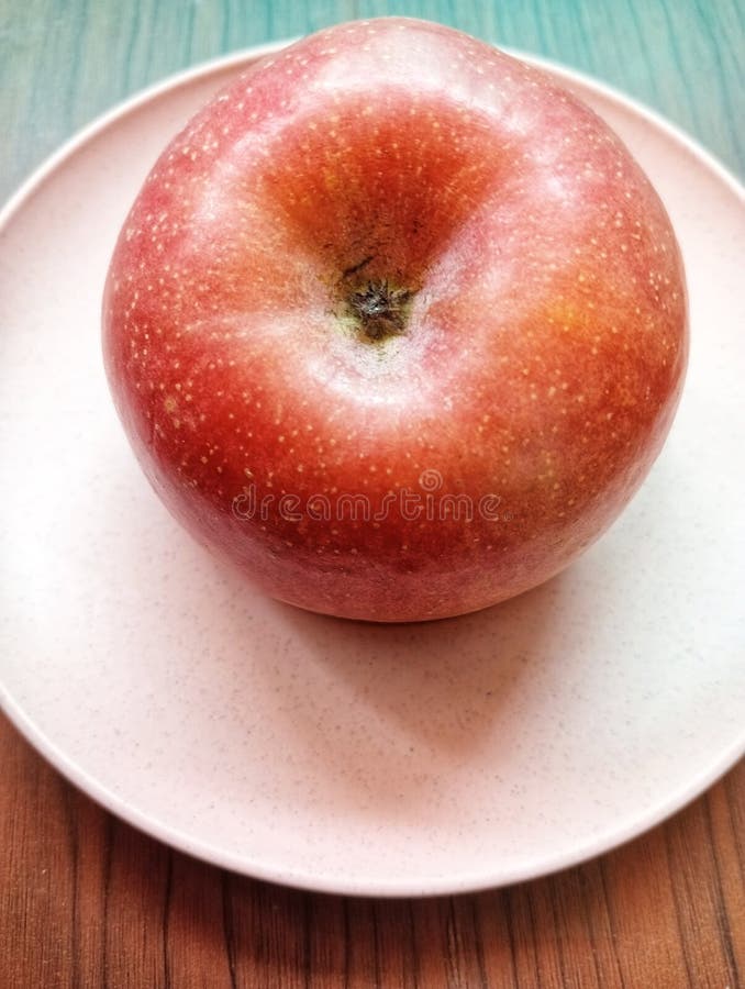 Portrait of an Apple on the Table Stock Photo - Image of petal ...