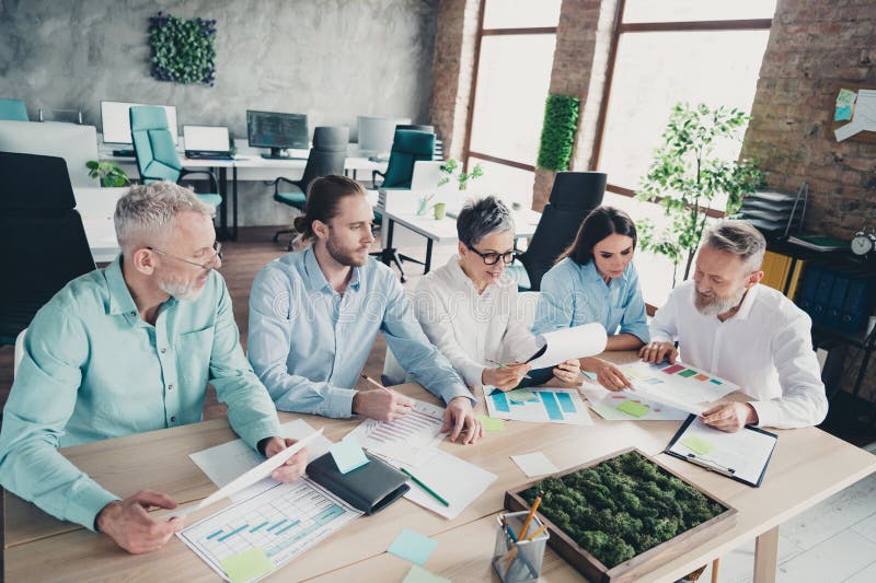 Photo of Teamwork People Working Together Discuss Documents Group ...