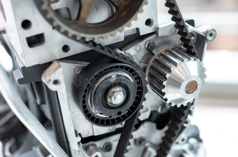 Photo of a Timing Belt and Pump on a Machine Engine. New Timing Belt ...