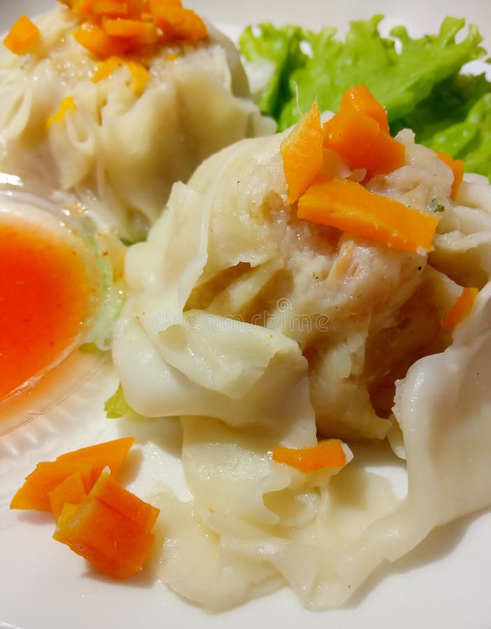Simple Photo Top View Close Up of Dim Sum with Carrot Stock Image ...