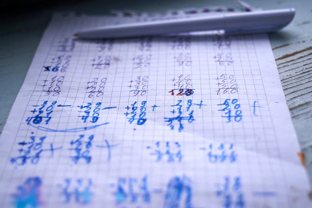 Photo of Torn Page from Math Notebook Stock Photo - Image of white ...