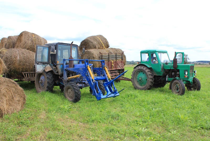 Photo, Two Tractors in the Field Stock Photo - Image of land ...