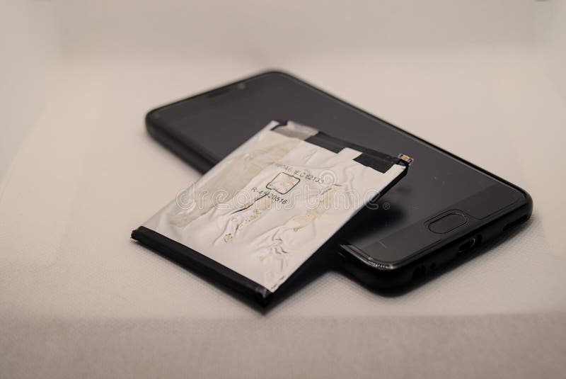 Photo of Used Battery and Smartphone Stock Image - Image of object ...