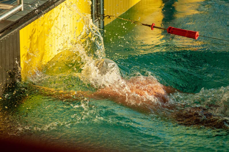 Photo of Water Splash in Swimming Pool Stock Photo - Image of crawling ...