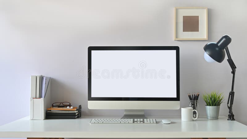 Photo of White Blank Screen Computer and Office Equipment is on the ...