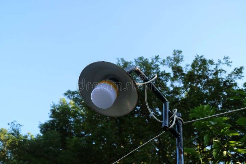 Photo of White Street Light with a Circular Umbrella Above it Stock ...
