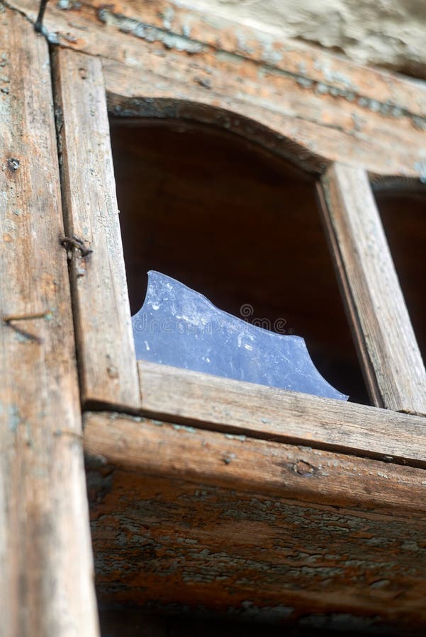 Broken Glass on a Windowsill in an Abandoned House Stock Photo - Image ...
