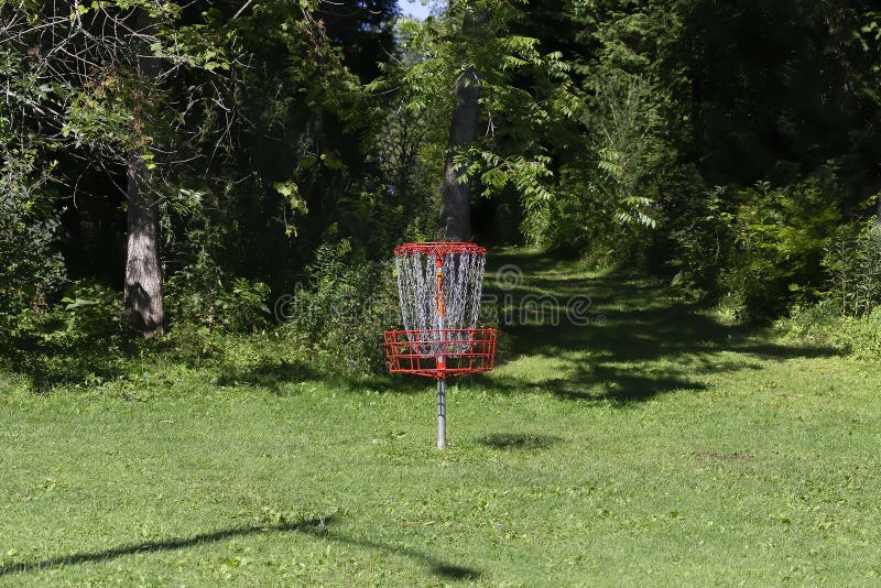 Disk Golf Basket in the Park Stock Photo - Image of hole, game: 259303910