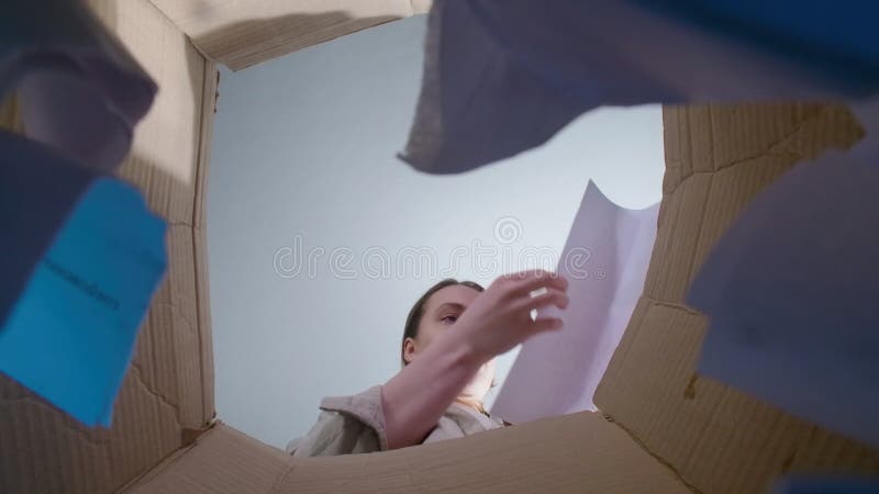 Photo of Woman Throwing Teared Paper, Bottom View Stock Photo - Image ...