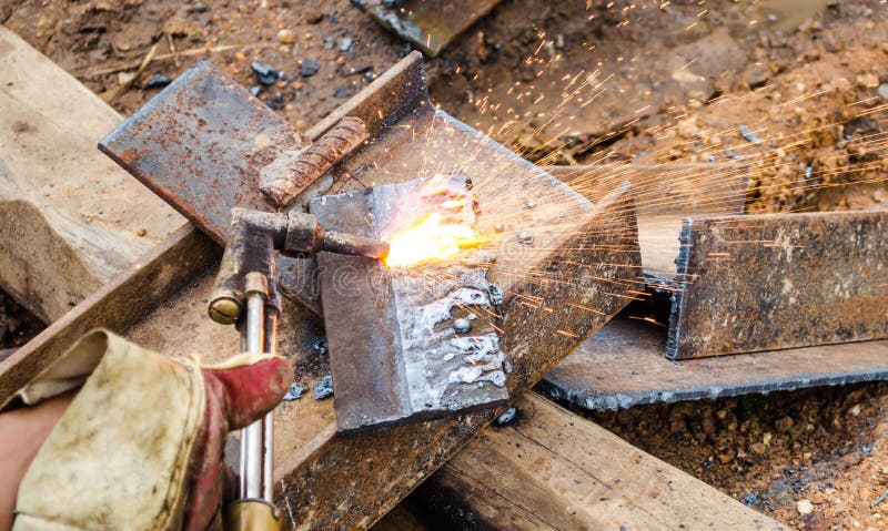 Photo of Worker Doing Gas Cutting on Steel Stock Photo - Image of steel ...
